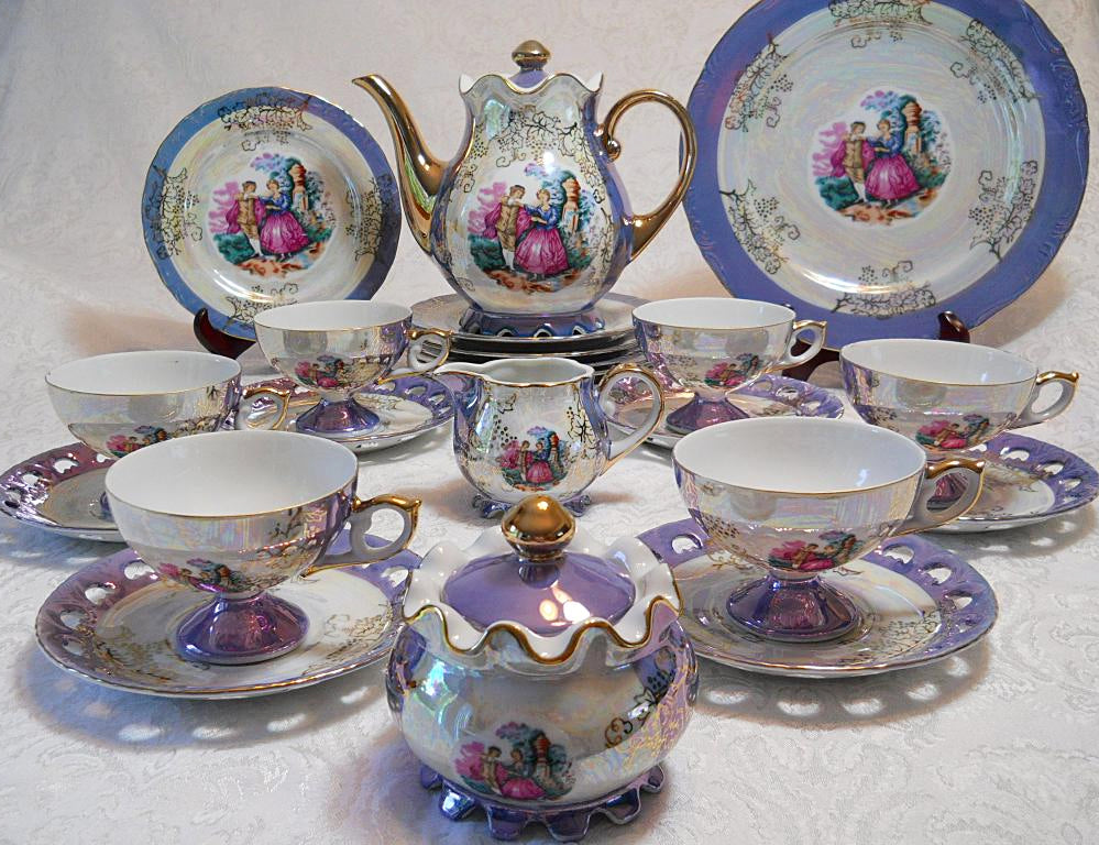 Lusterware Musical Coffee/Teapot and Six Cup/Saucer Set in Lusterware Musical Coffee/Teapot and Six Cup/Saucer Set in